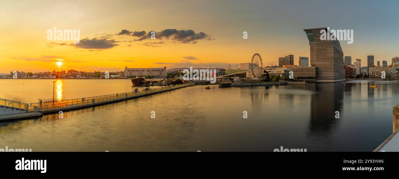 View of the Munch Museum and city skyline at sunset, Oslo, Norway ...