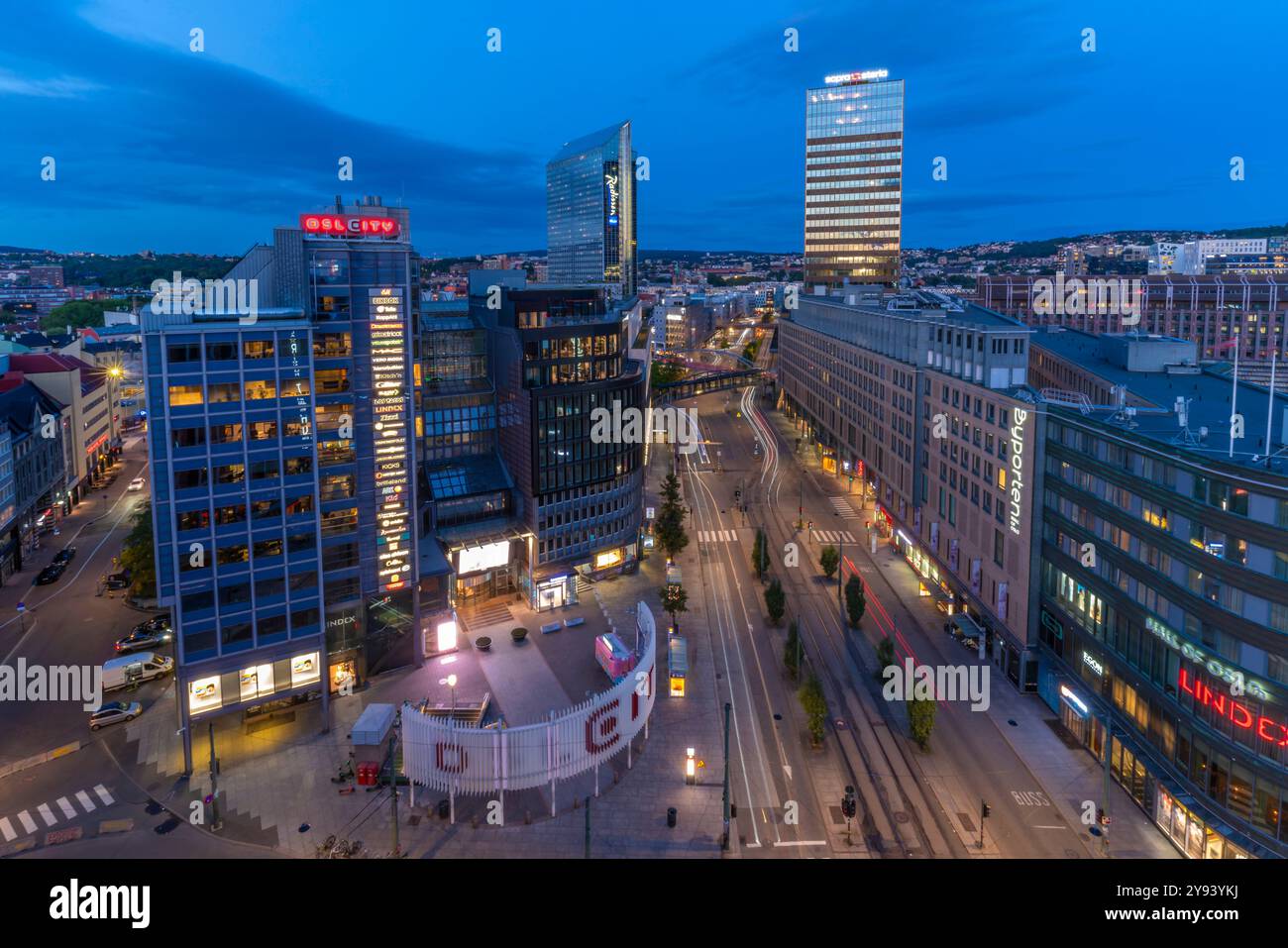View of Jernbanetorget and city skyline from elevated position at dusk ...