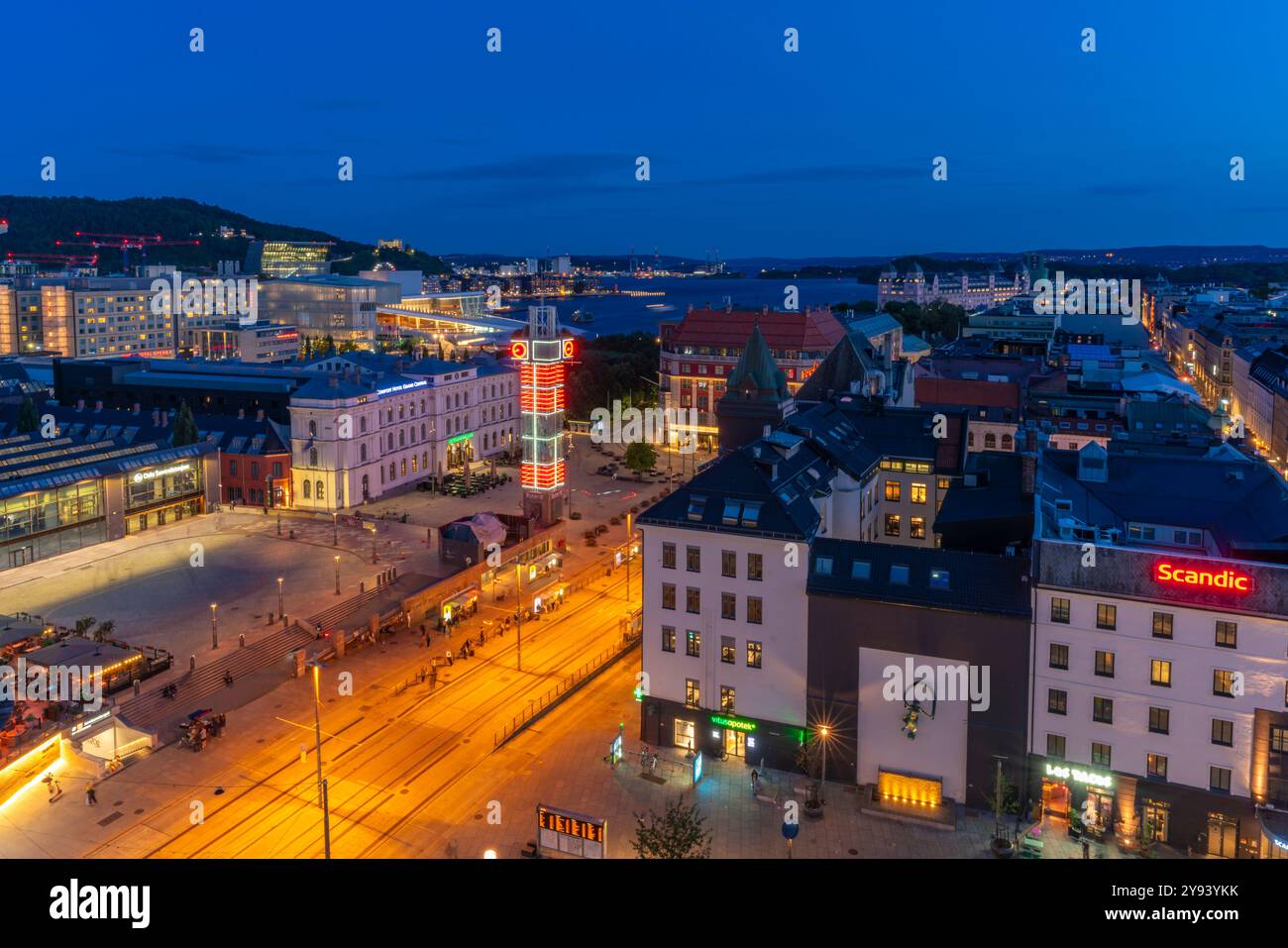 View of Jernbanetorget and city skyline from elevated position at dusk ...