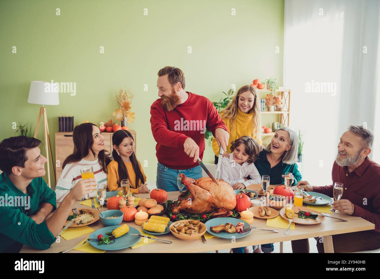 Photo of nice charming family celebrating thanksgiving day together man ...