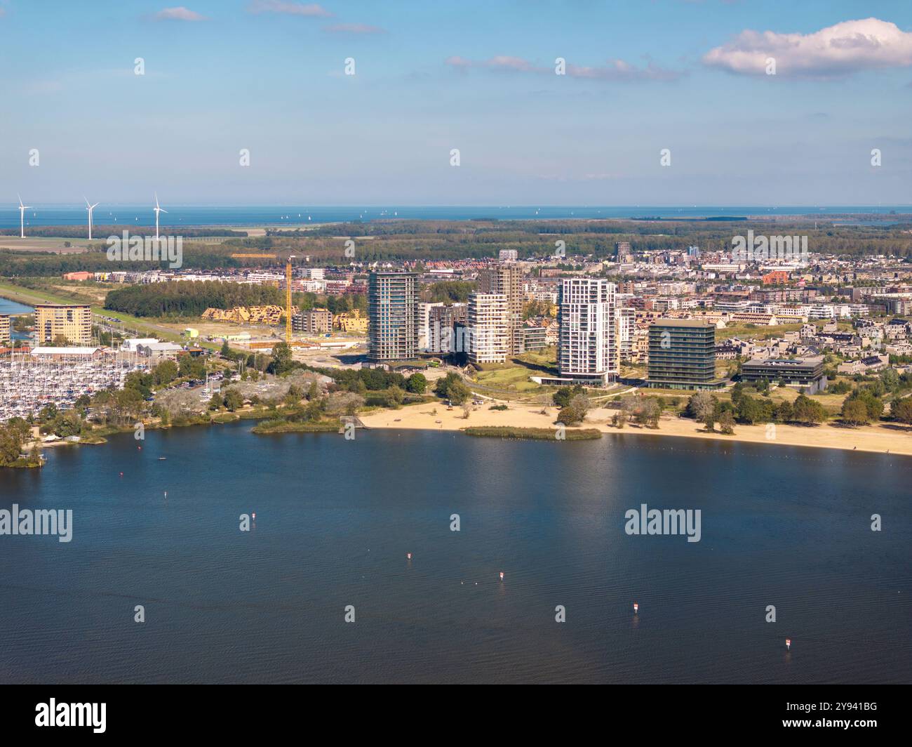 aerial view of the new high-rise district '"Almere Duin", Flevoland ...