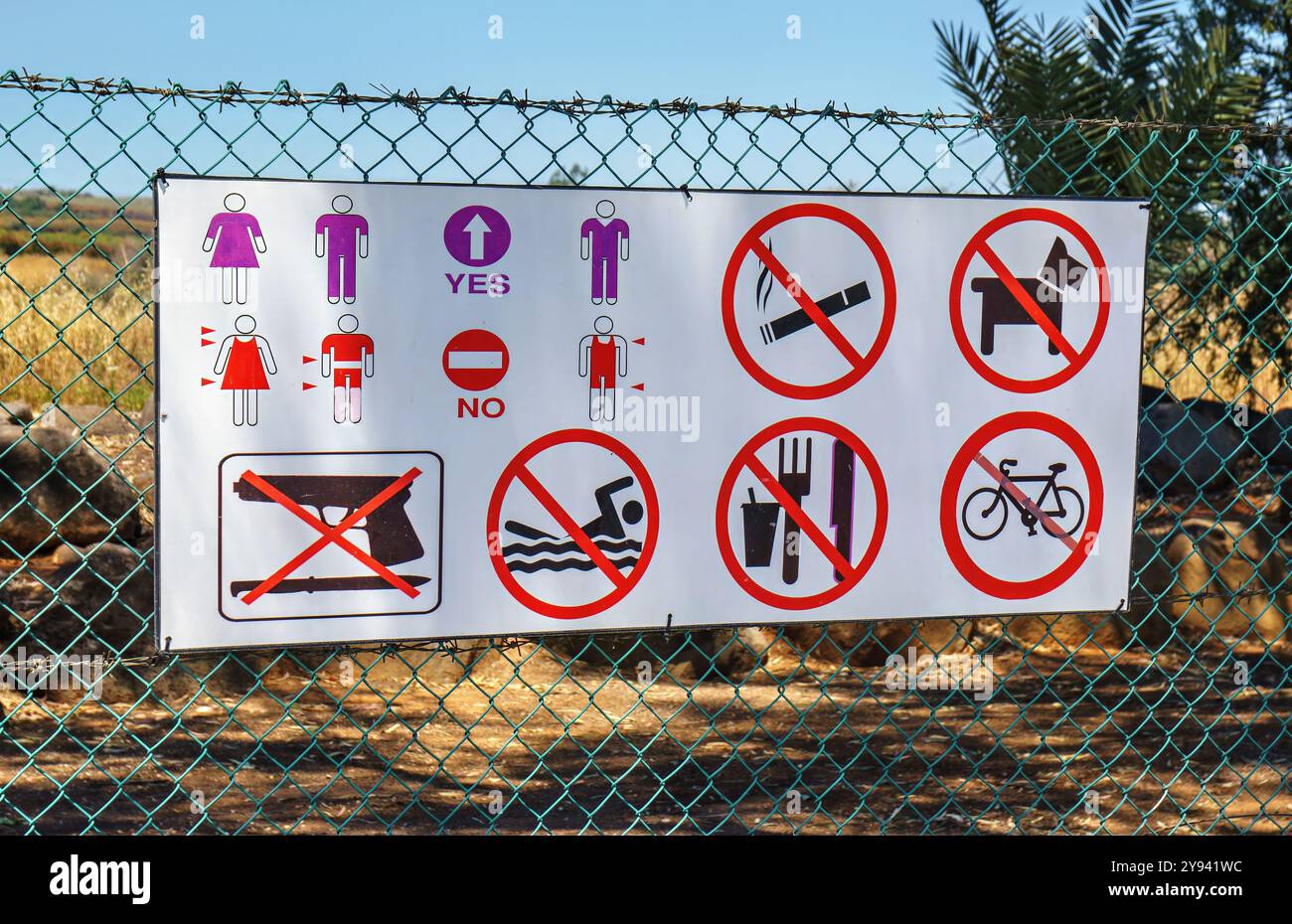 A view of a sign in Israel showing forbidden things Stock Photo - Alamy