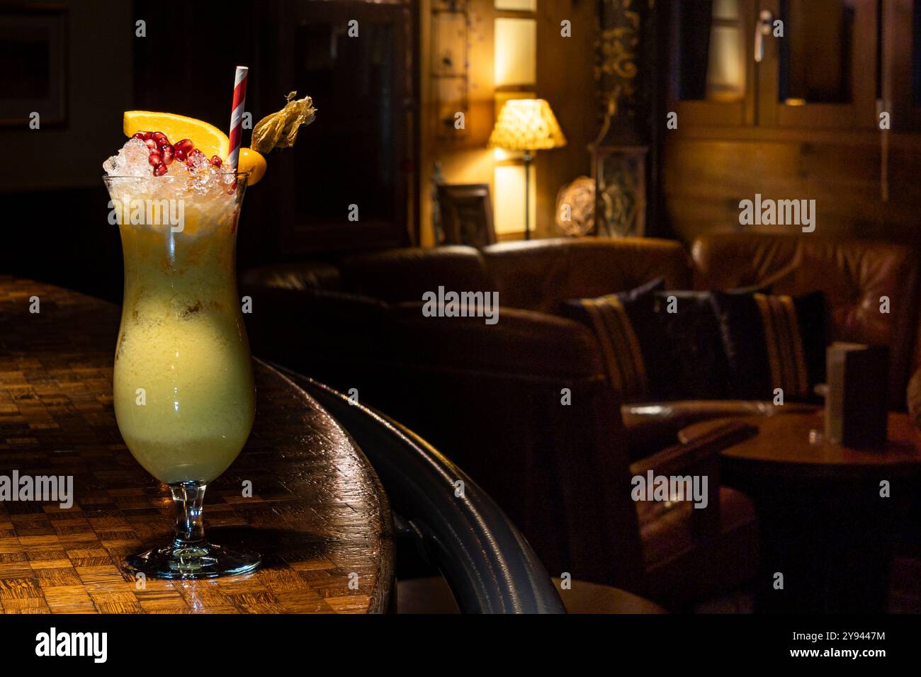 An inviting cocktail served in a cozy mountain bar setting with classic ...