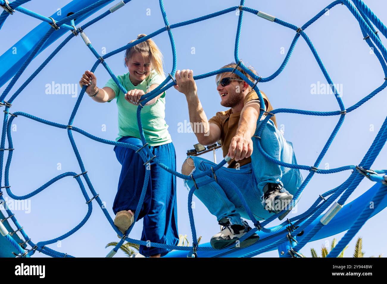 A young boy with visual-spatial challenges enjoys navigating a climbing ...