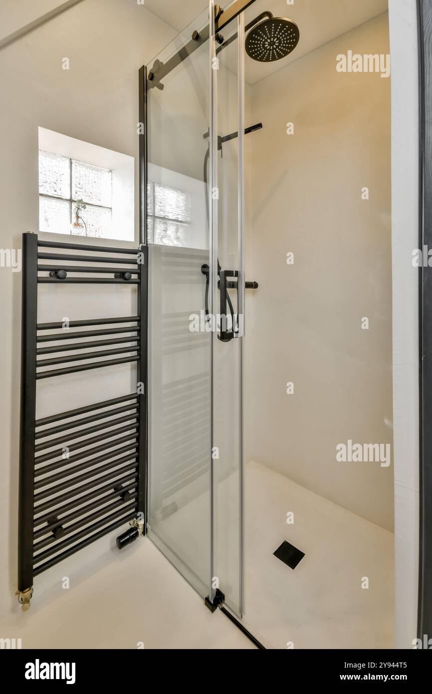 Contemporary bathroom interior showcasing a walk-in shower with glass ...