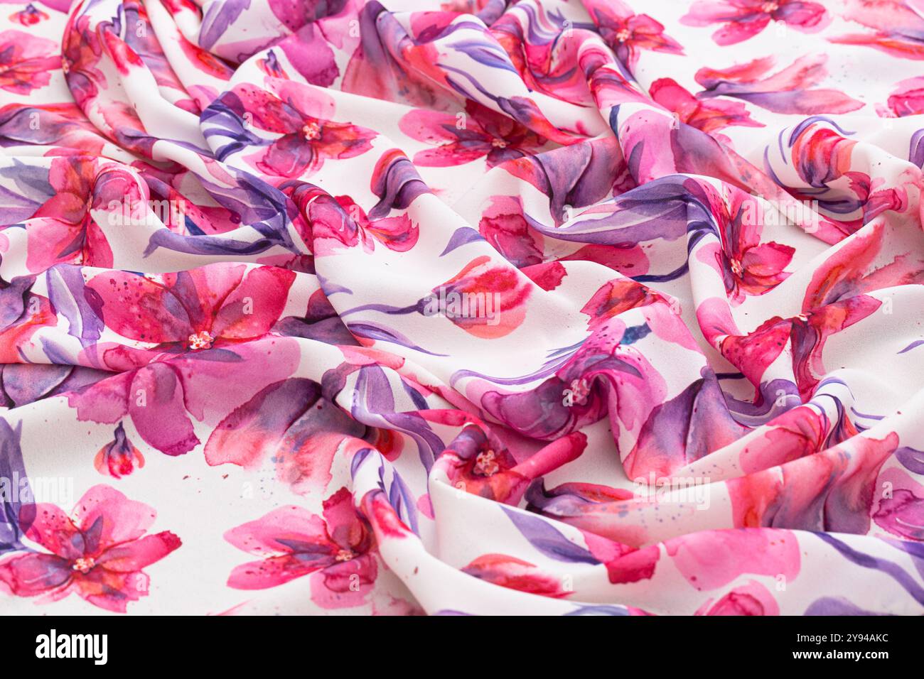 Colorful floral pattern fabric with watercolor-style flowers in shades ...