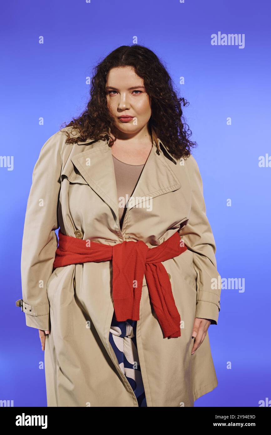 A confident plus size woman elegantly models a chic outfit, radiating ...