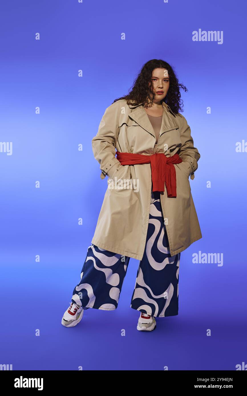 A confident plus size woman shows off her style in a trendy trench coat ...
