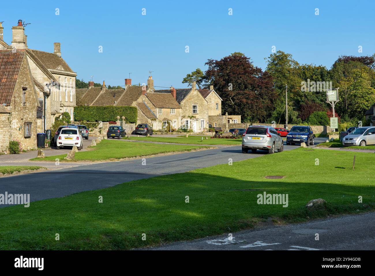 Village Green at the picturesque village of Biddestone in the Cotswolds ...