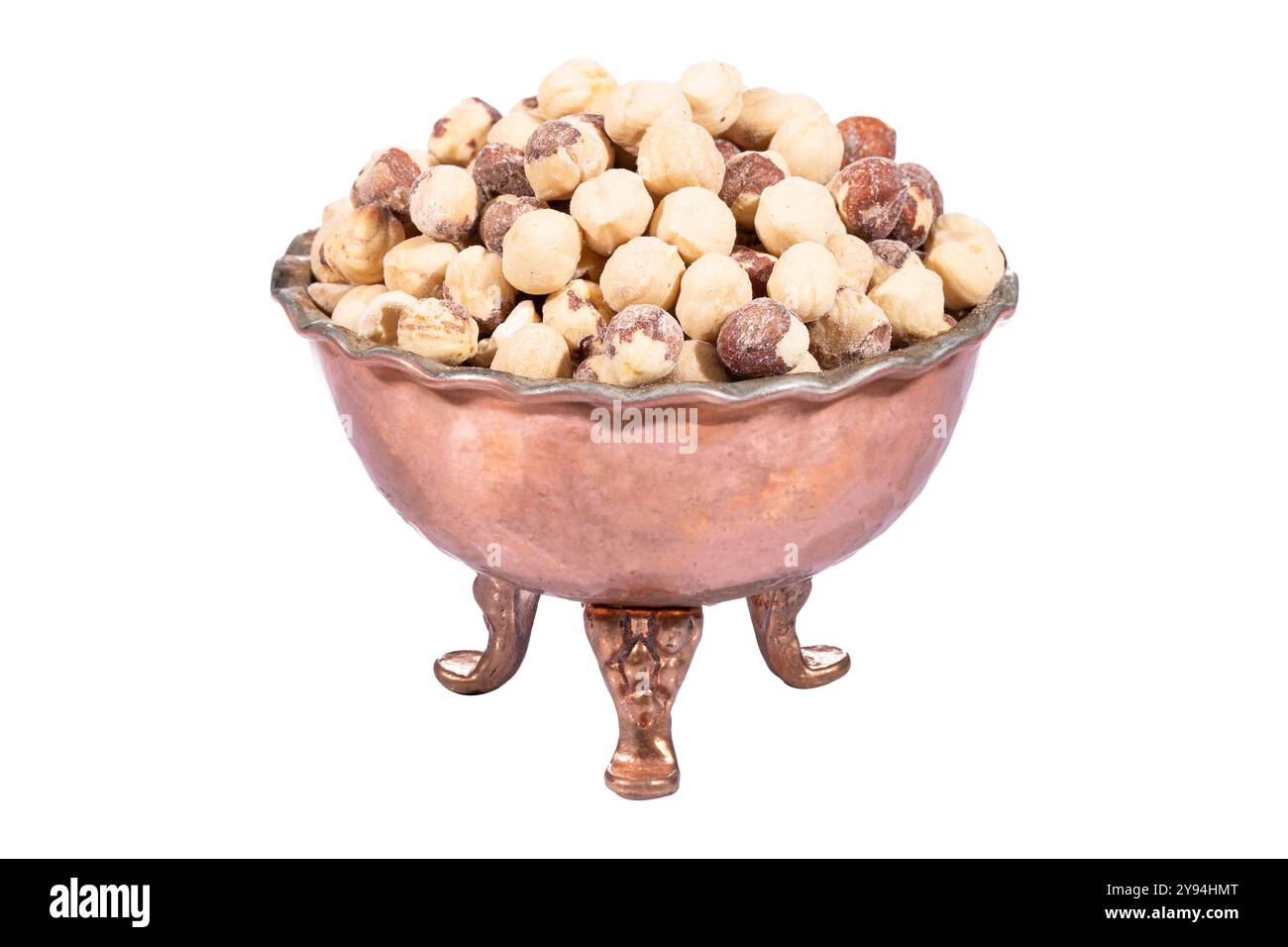 Roasted hazelnuts in an antique copper bowl. Healthy snack, food ...