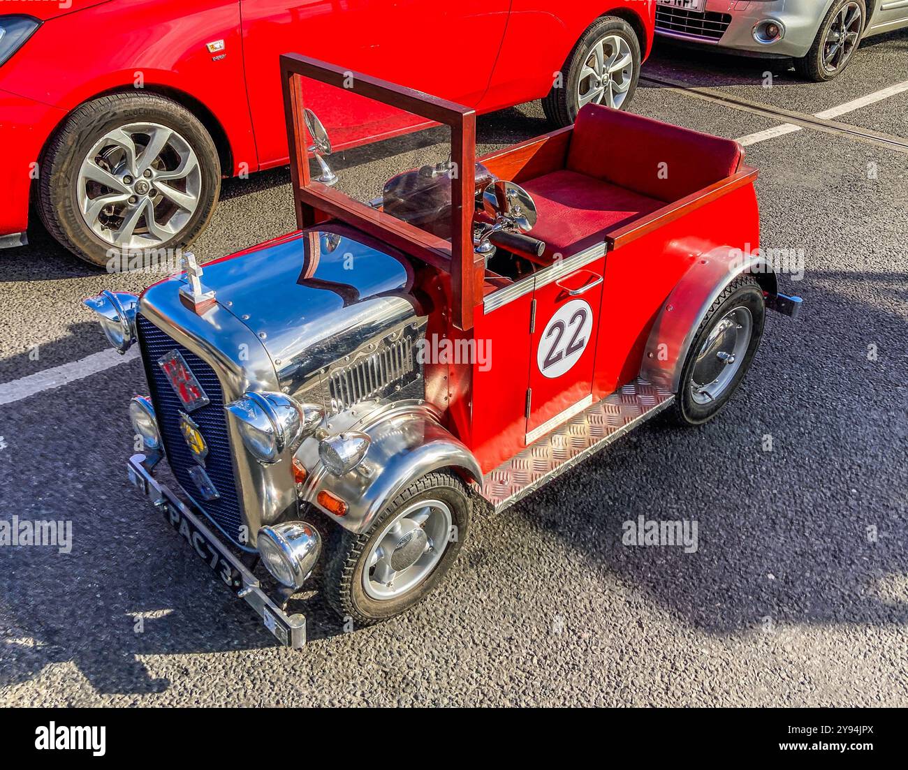 An Small, Electric Mobility Vehicle made into the shape of a Classic ...