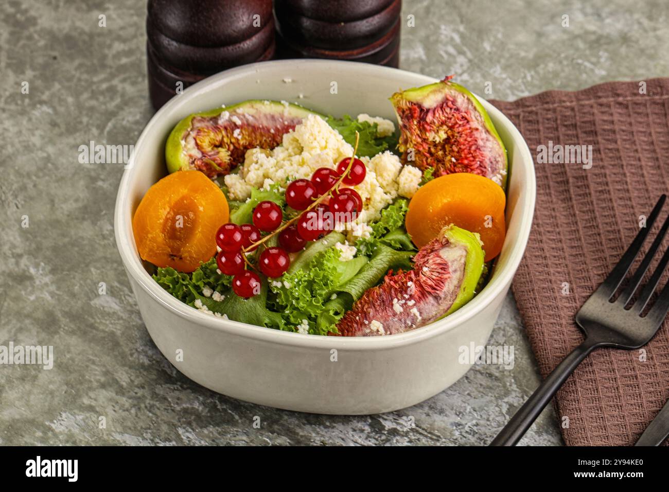 Salad with fig and sheep cottage cheese Stock Photo - Alamy