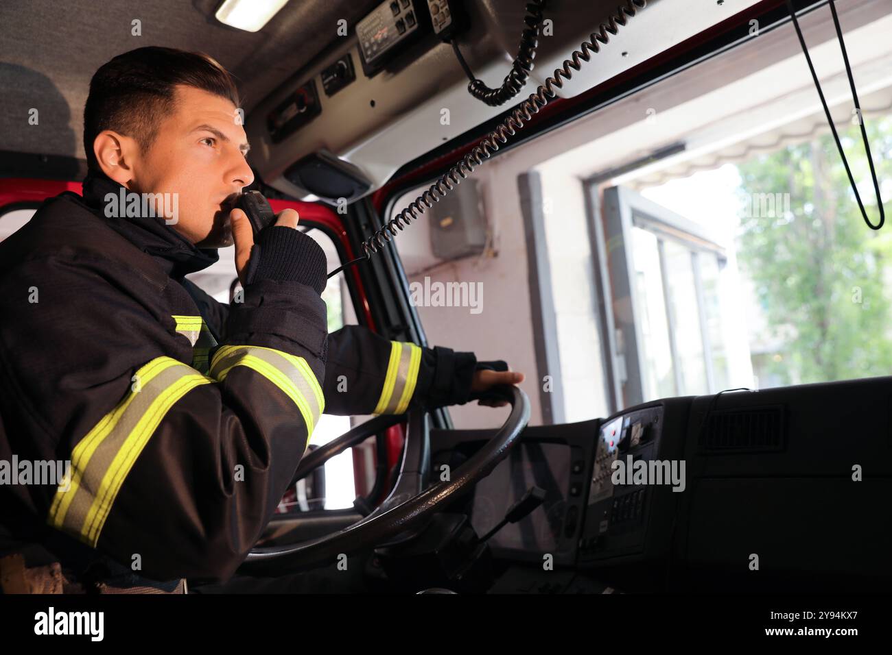 Firefighter radio inside fire truck hi-res stock photography and images ...