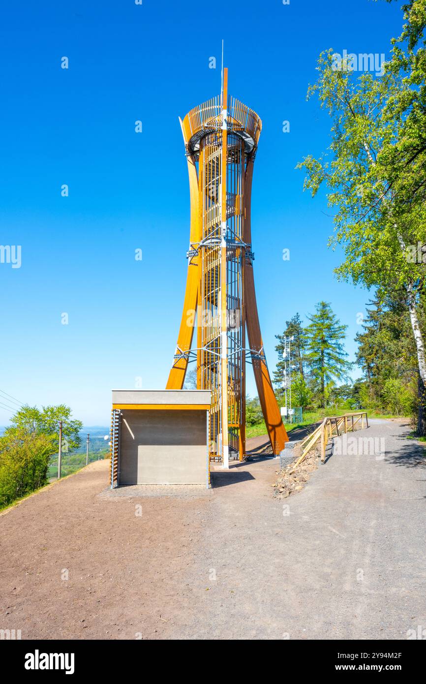 The Hamstejn lookout tower stands tall with a spiral staircase and ...