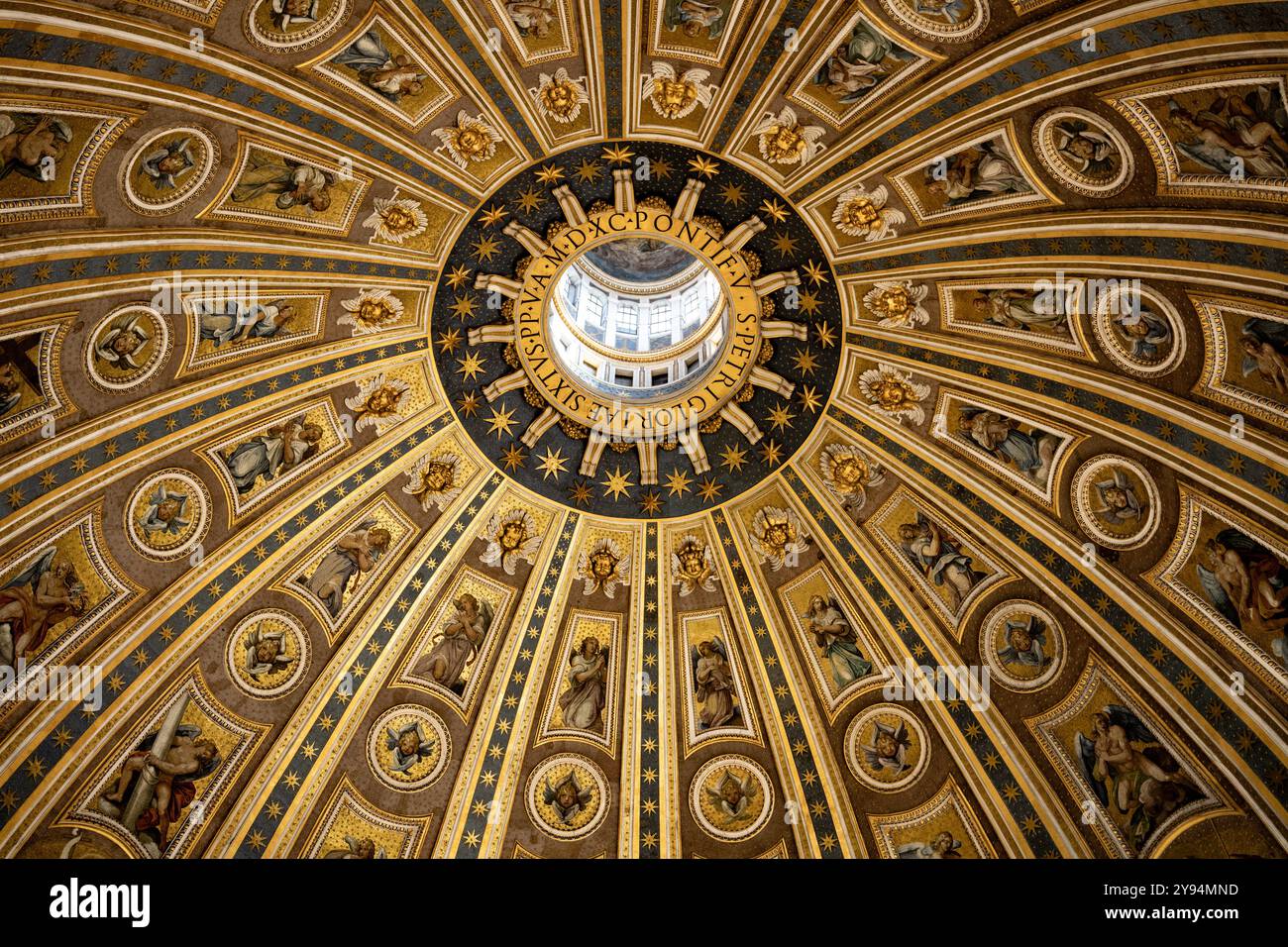 The magnificent interior dome of Saint Peter Basilica displays ...