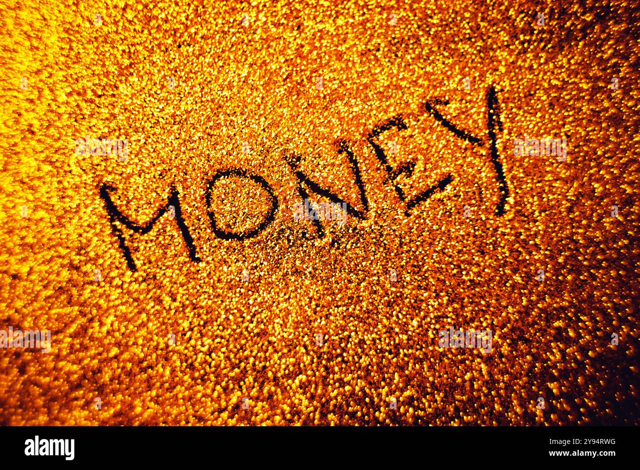 Text Money on golden rich shiny background Stock Photo - Alamy