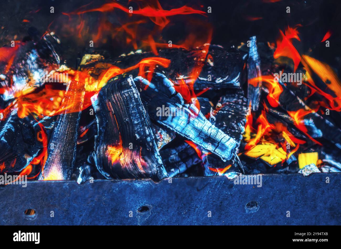 Hearth in a metal brazier. Lighting a fire for cooking barbecue Stock ...