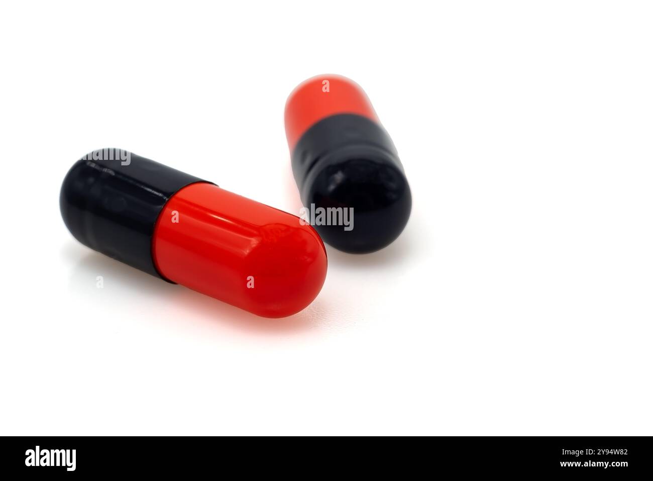 Tablets, colored capsules on a white background. Medicines Stock Photo ...