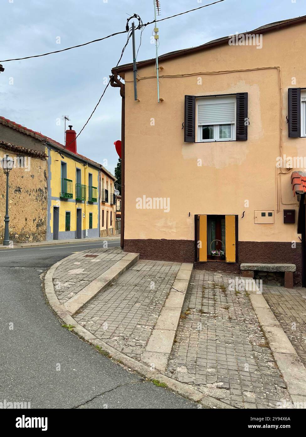 Street and facade of house. Pinilla del Valle, Madrid province, Spain ...