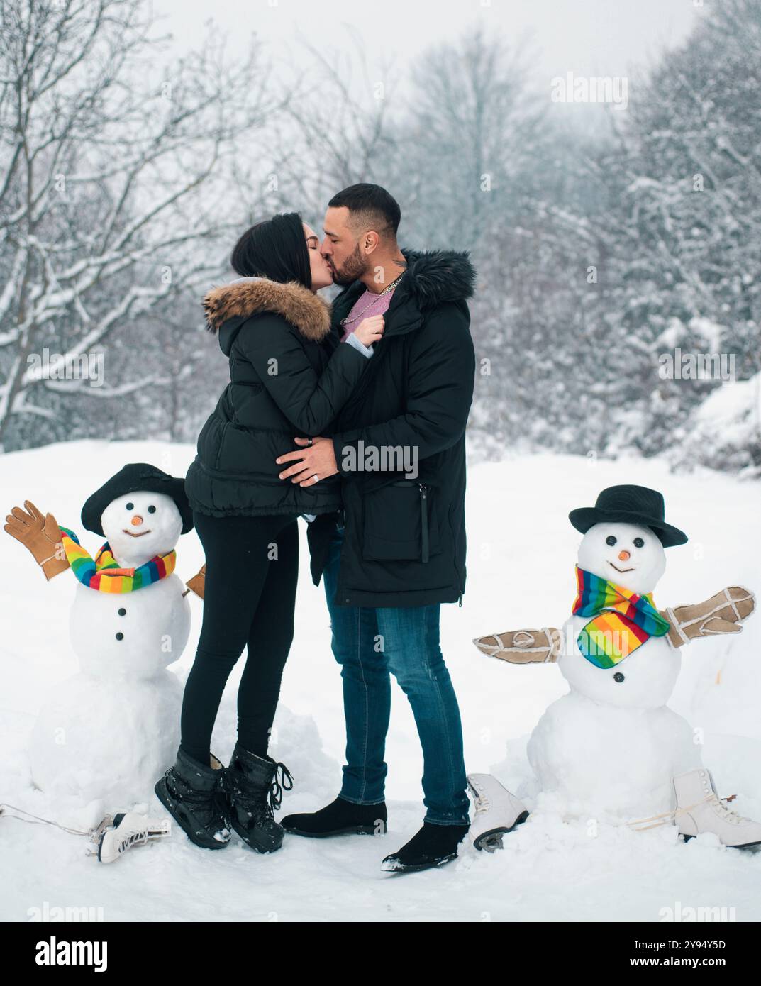 Couple on ice kissing outdoors hi-res stock photography and images - Alamy