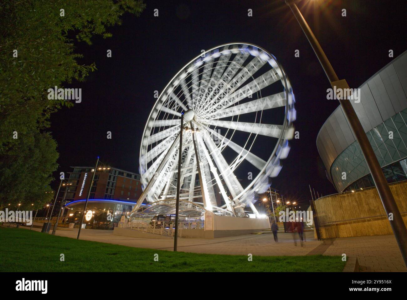 Ferris wheel lit up at night in Liverpool, UK Stock Photo - Alamy