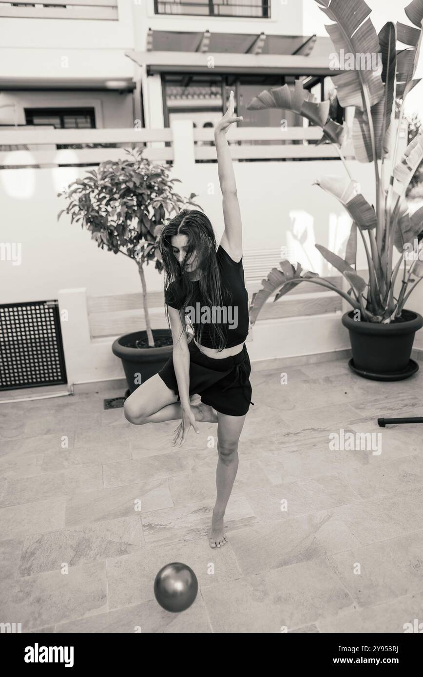 A Dynamic Dance Pose Captured Beautifully in an Outdoor Setting Full of ...