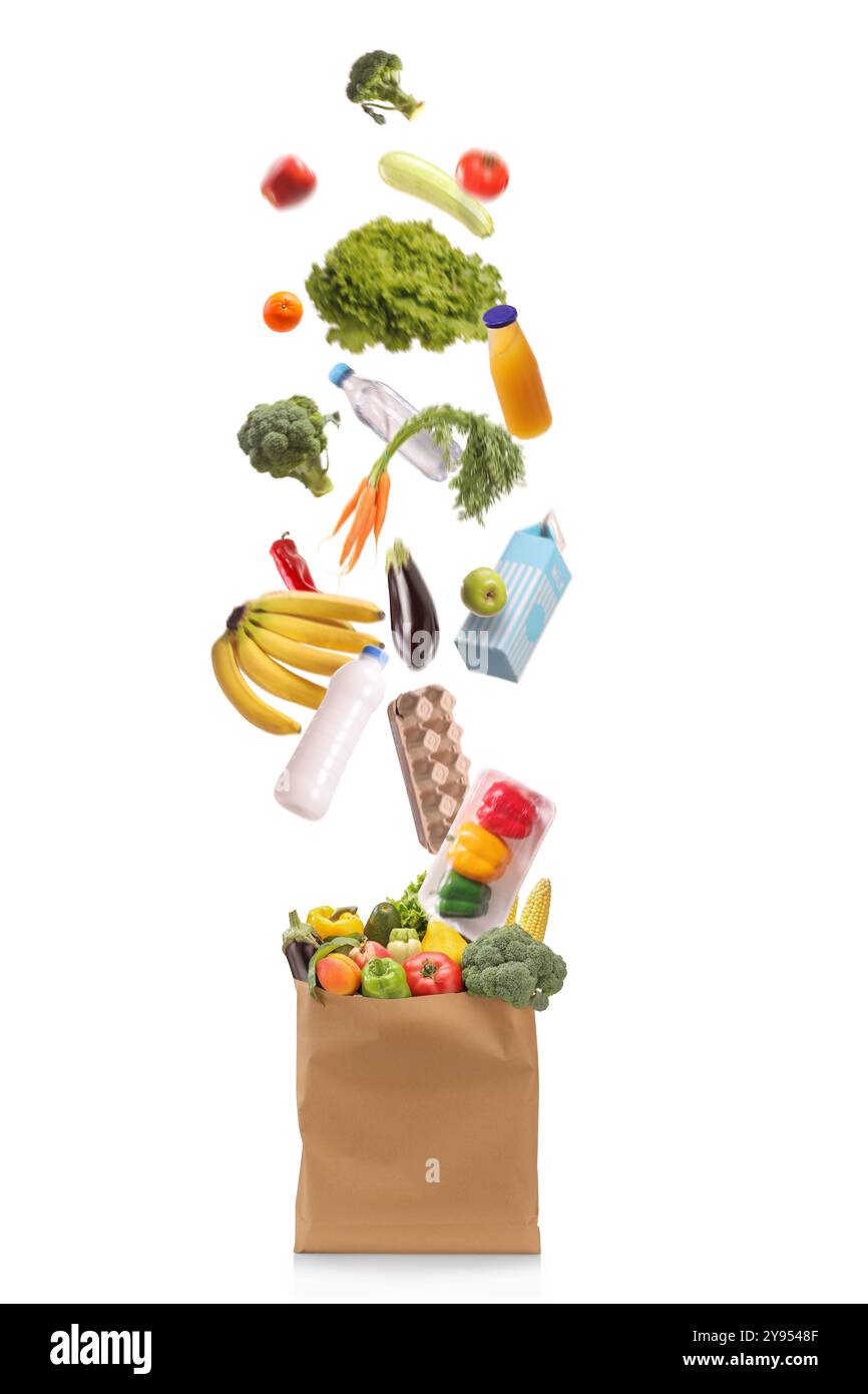Groceries falling in paper hi-res stock photography and images - Alamy