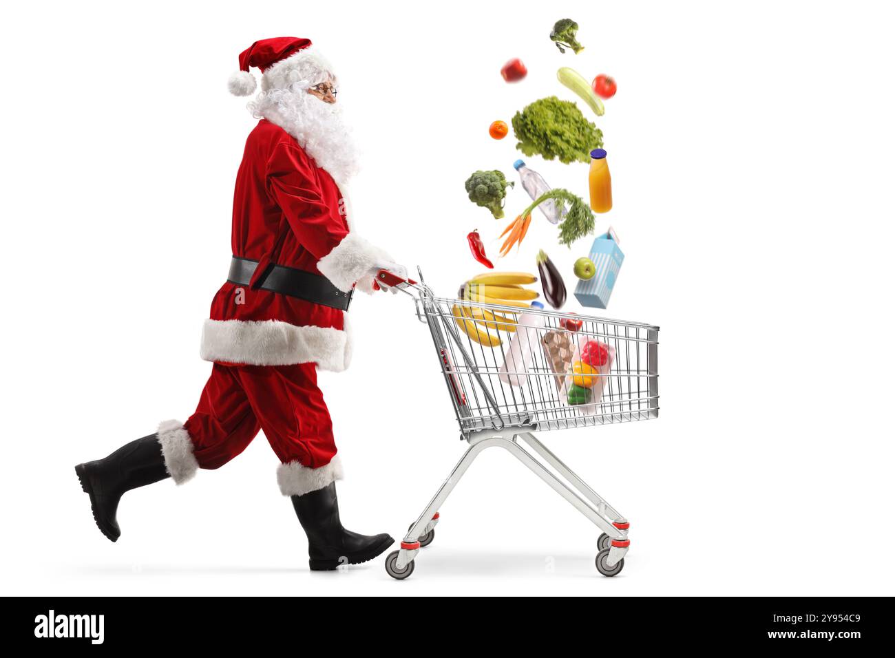 Santa Claus running with a shopping cart and groceries falling in the ...