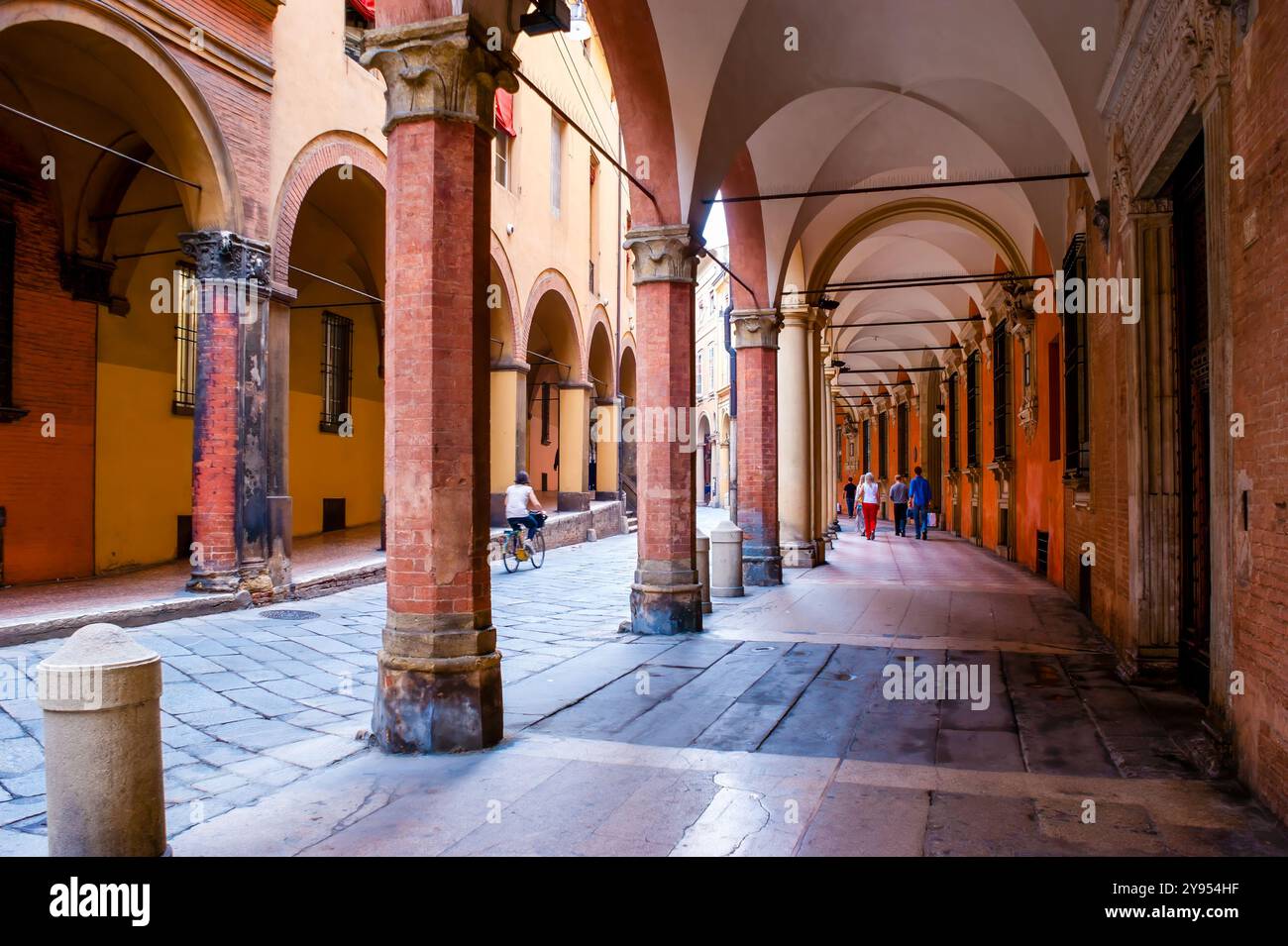 Typical Italian winding street Via Castiglione with porticos, the ...