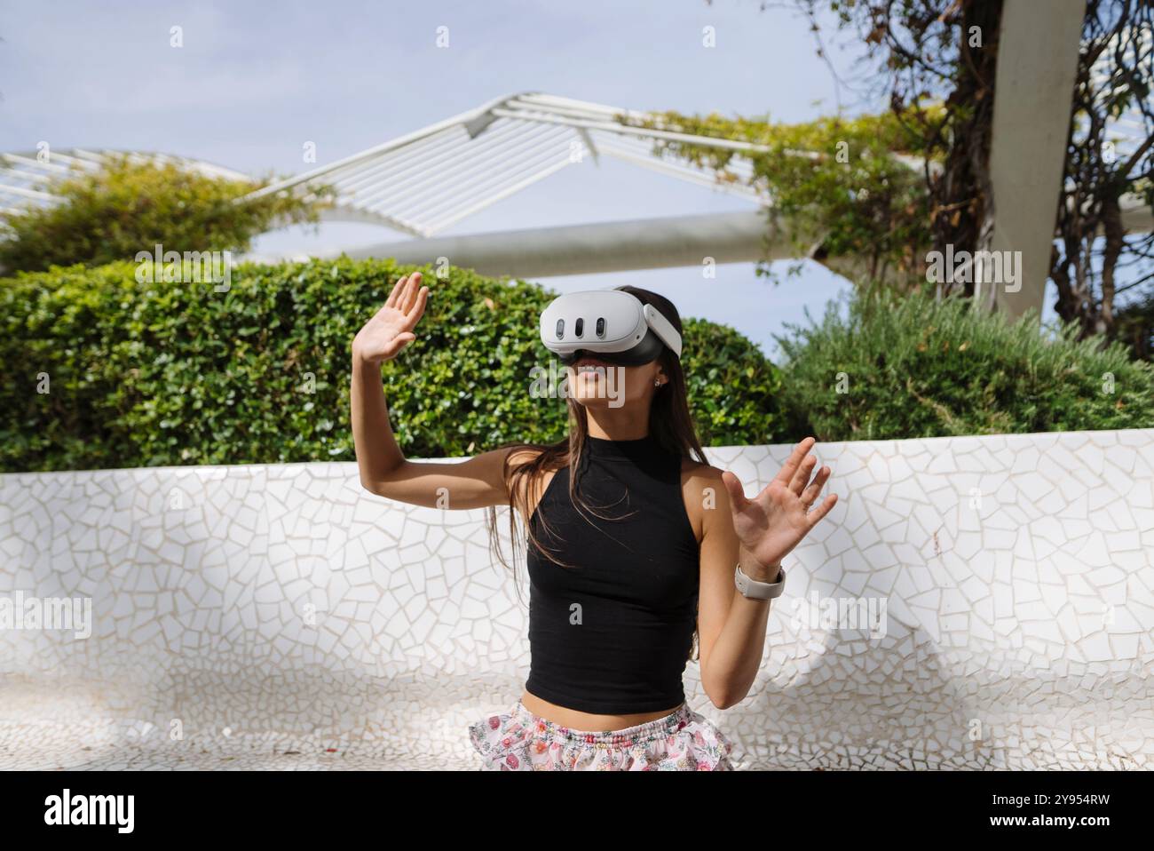 A Young Woman Fully Immersed in an Exciting Augmented Reality ...