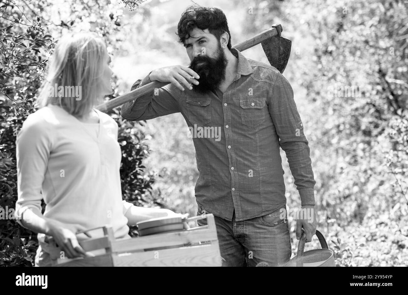 Portrait of pair of farms Working In Garden Together. Family of rural ...