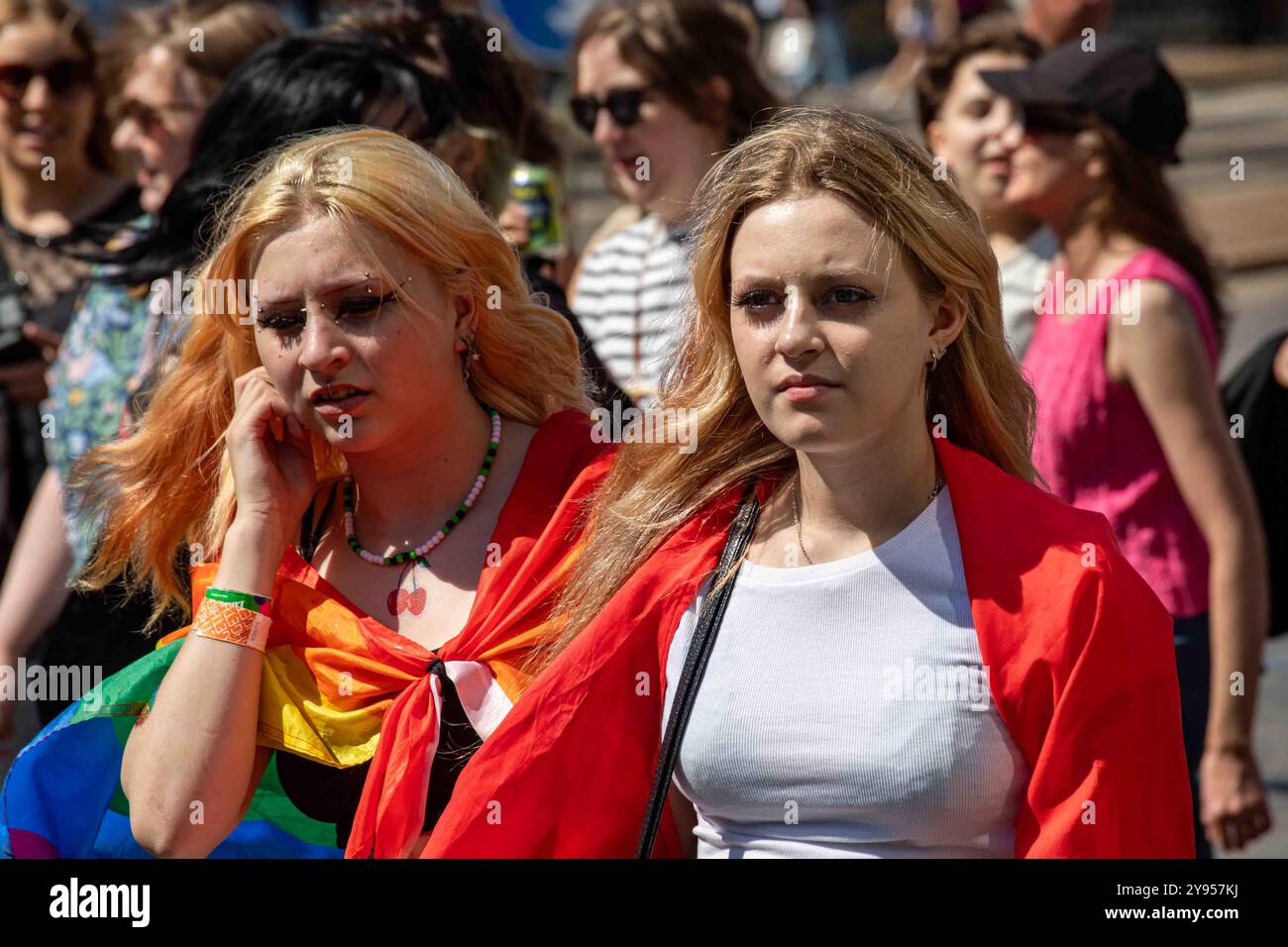 Young women wearing rainbow flags at Helsinki Pride 2024 Parade on ...