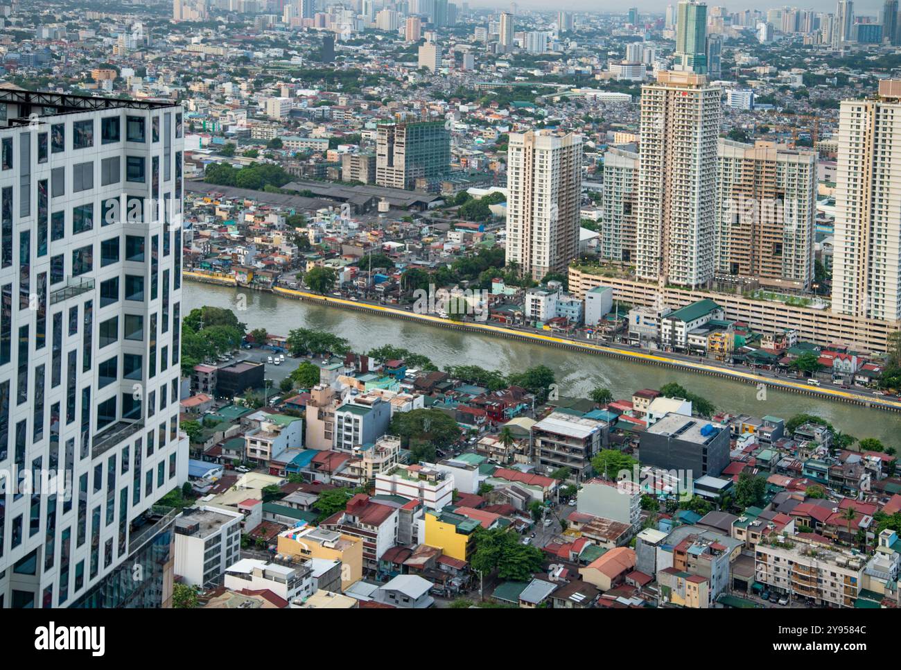 Manila,Philippines-May 16 2023:The Pasig River runs through the vast ...