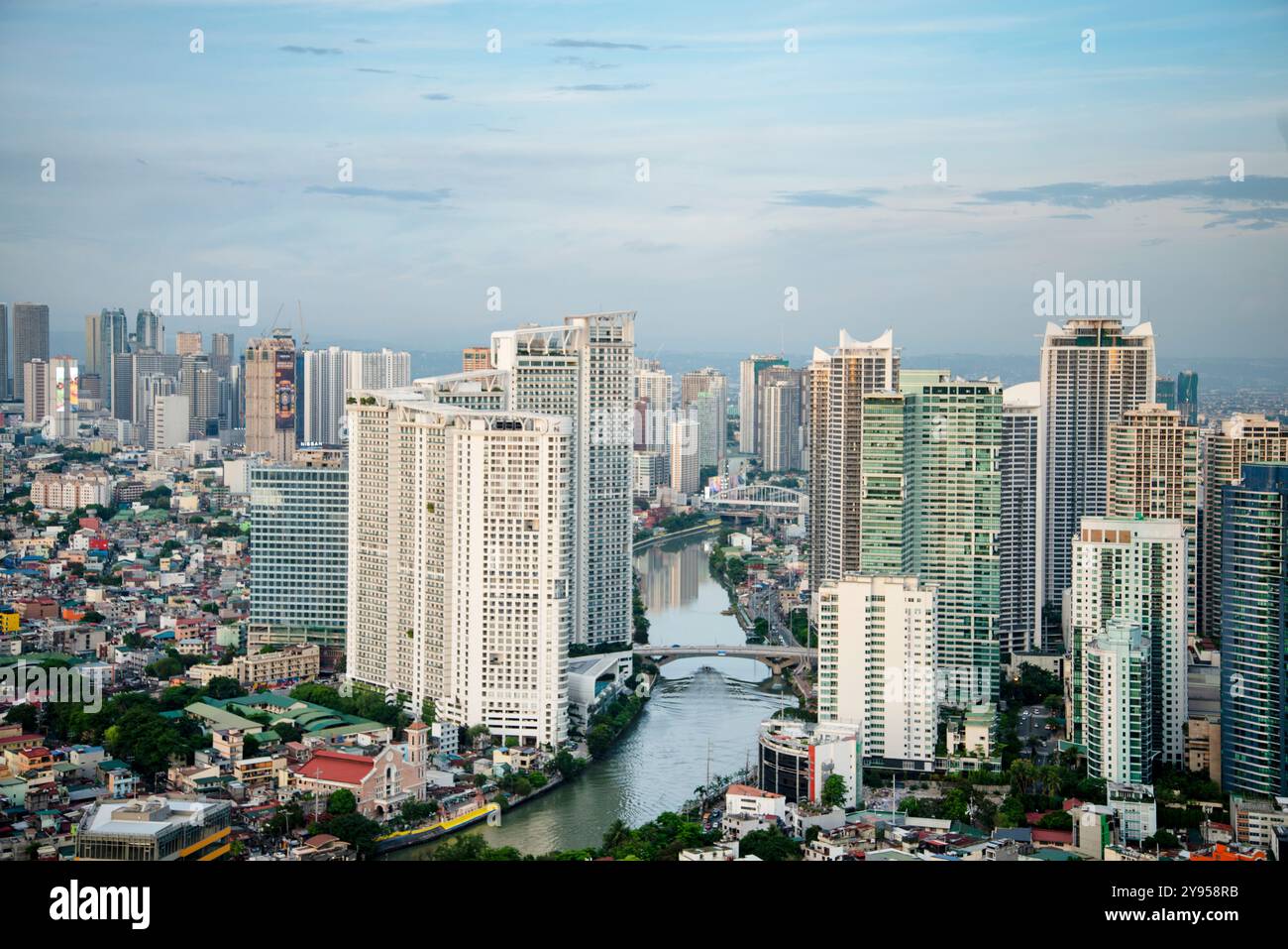 Manila,Philippines-May 16 2023:The Pasig River runs through the vast ...