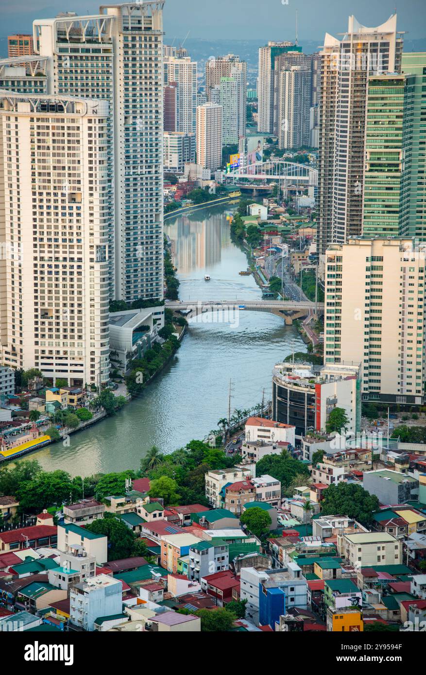 Manila,Philippines-May 16 2023:The Pasig River runs through the vast ...
