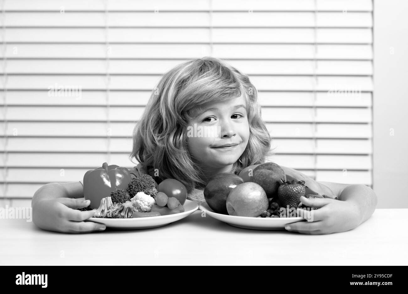 Fruits and vegetables. Child boy eating organic healthy food. Healthy ...