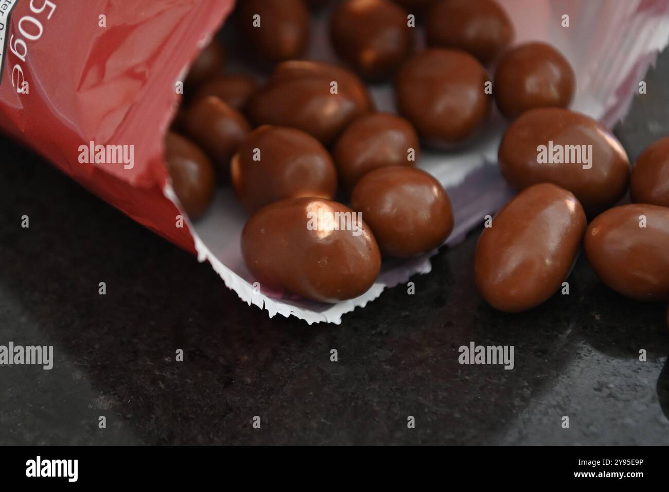 Milk chocolate nuts hi-res stock photography and images - Alamy