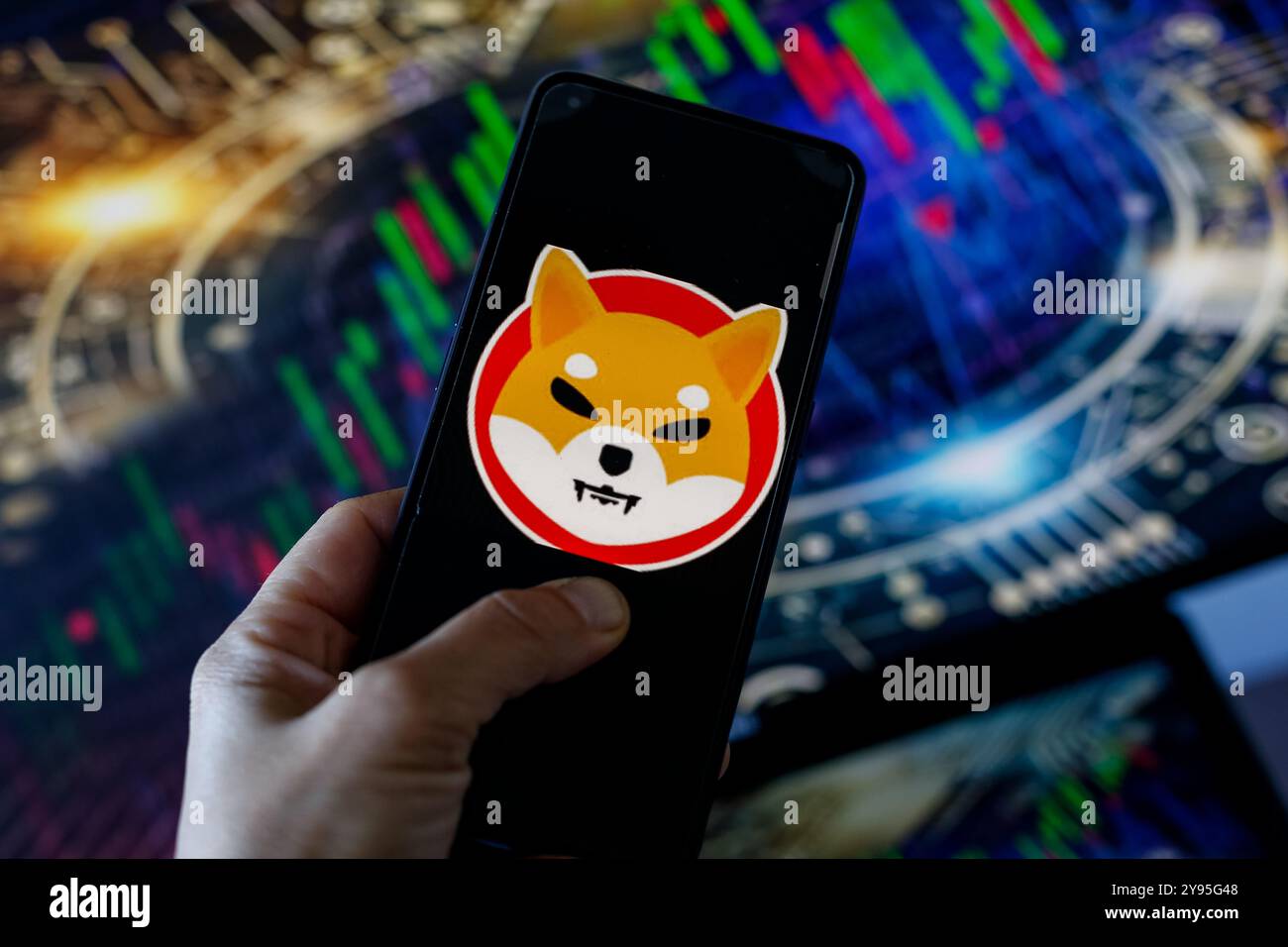 In this photo illustration, the Shiba Inu (SHIB) logo seen displayed on ...