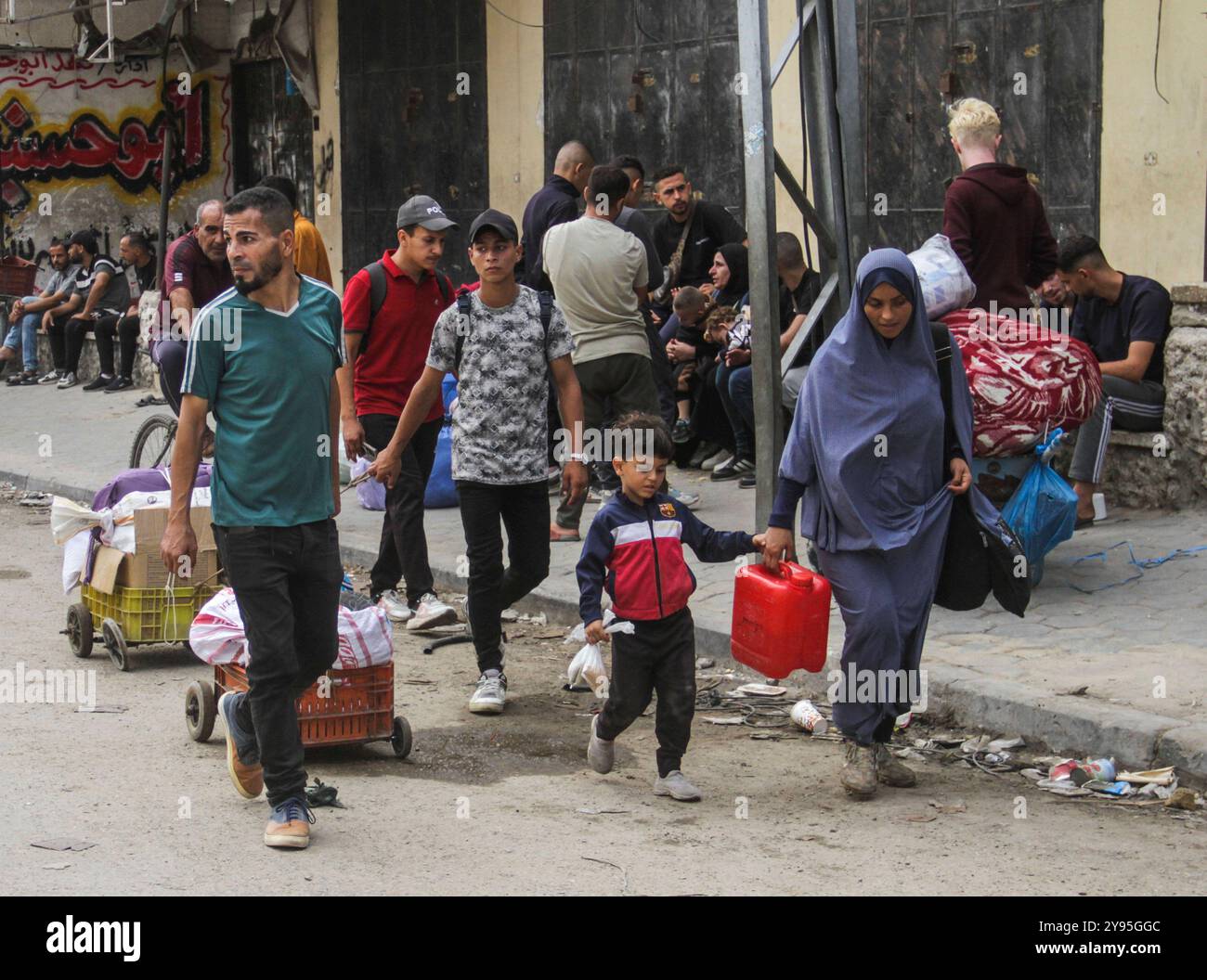 Gaza warMiddle East news. Palestinians flee Jabalia after an Israeli ...