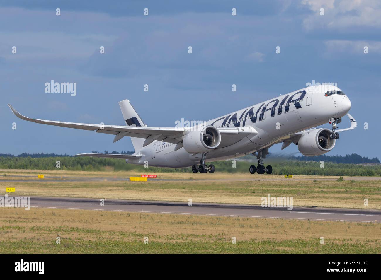 A Finnair Airbus a350 taking off from Helsinki Airport Stock Photo - Alamy
