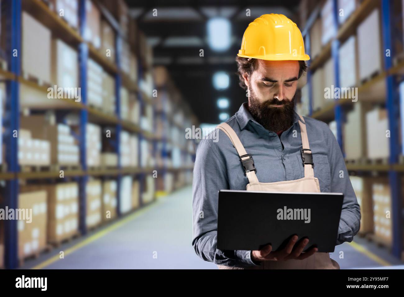 Packaging supervisor verifying stock of merchandise for supply chain ...