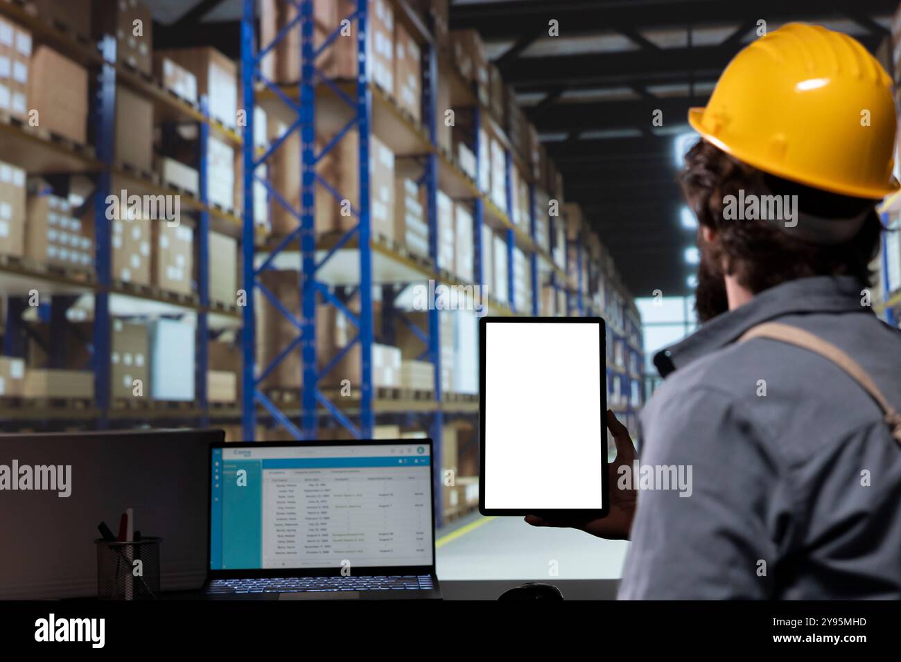 Storehouse manager uses white display on phone layout, analyzing ...