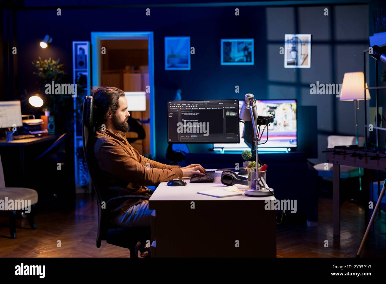 Engineer fixing vulnerabilities in software hi-res stock photography ...