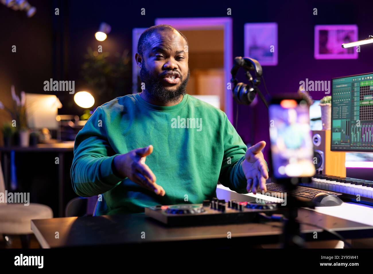 Sound engineer explaining all controls on a mixing console during ...