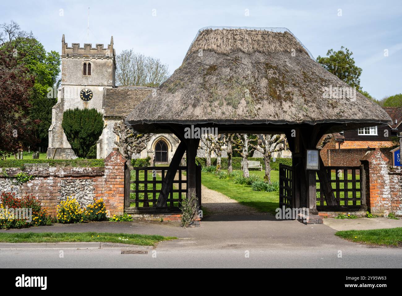 The traditional thatched lych gate at the parish church of St Mary in ...