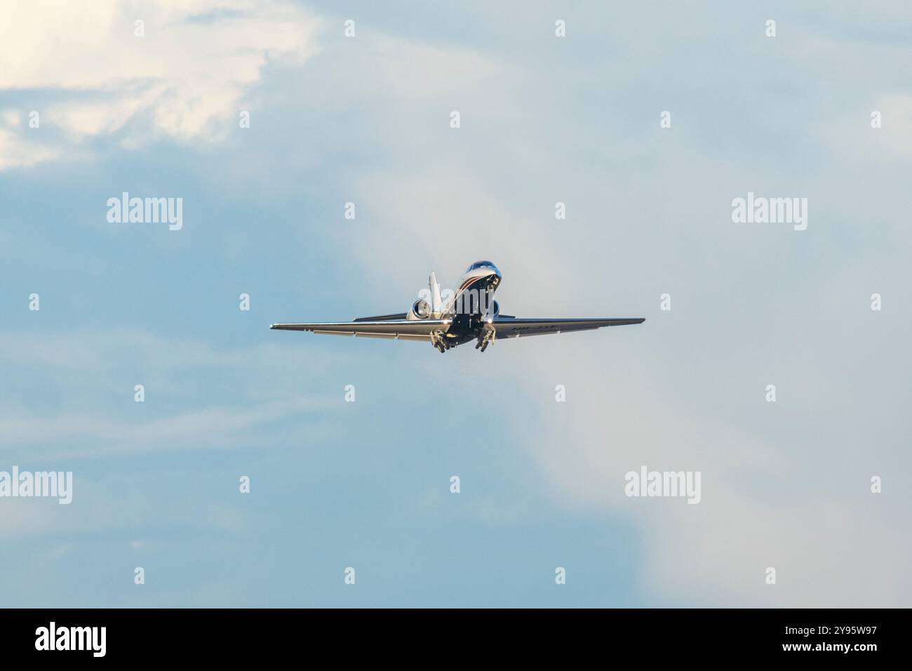 A small jet taking off Stock Photo - Alamy