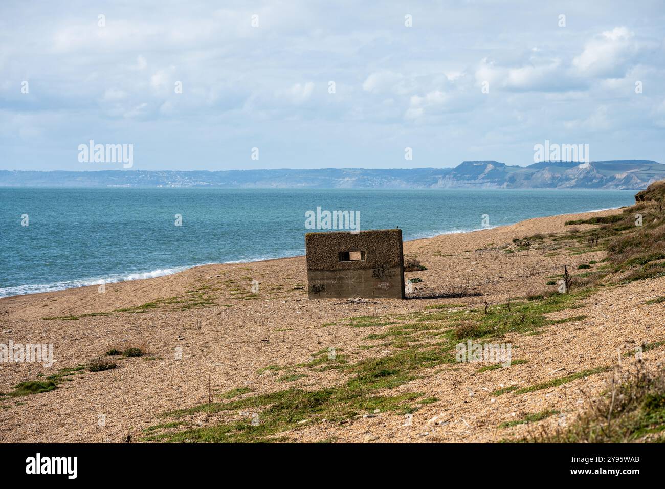 A World War 2 pill box stands on Chesil Beach near Abbotsbory on ...
