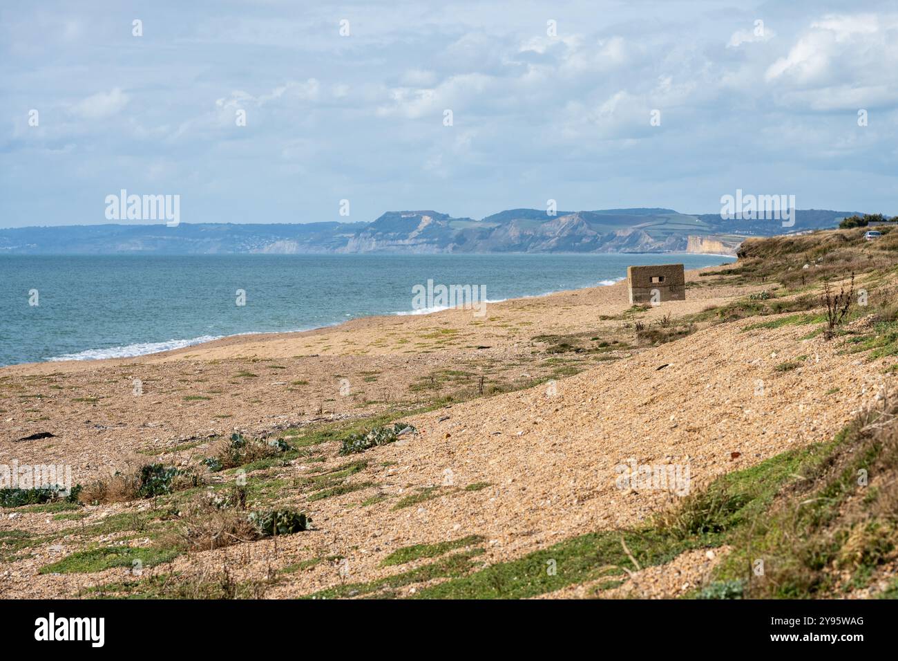 A World War 2 pill box stands on Chesil Beach near Abbotsbory on ...