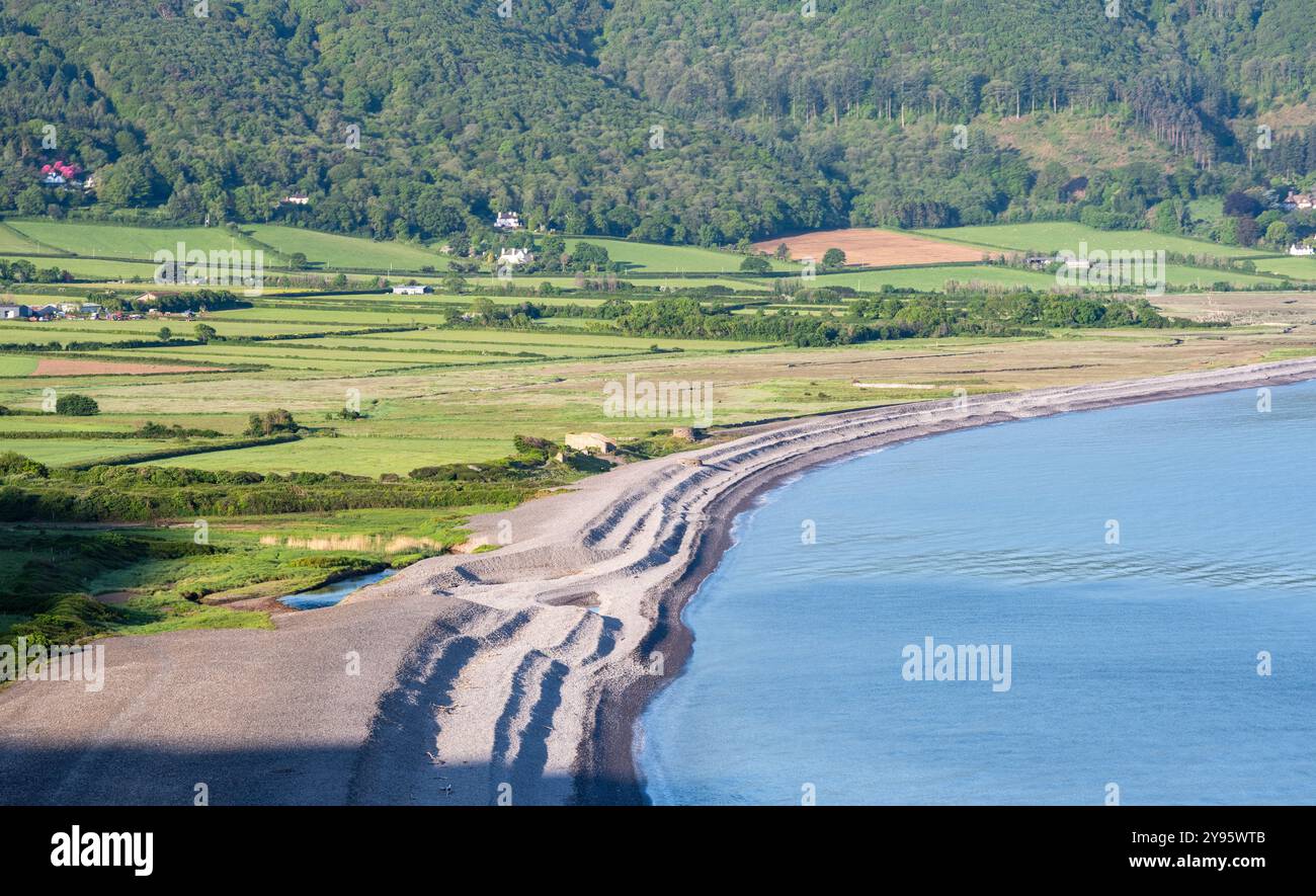 The shingle bank of Bossington Beach protects the lowland of Porlock ...
