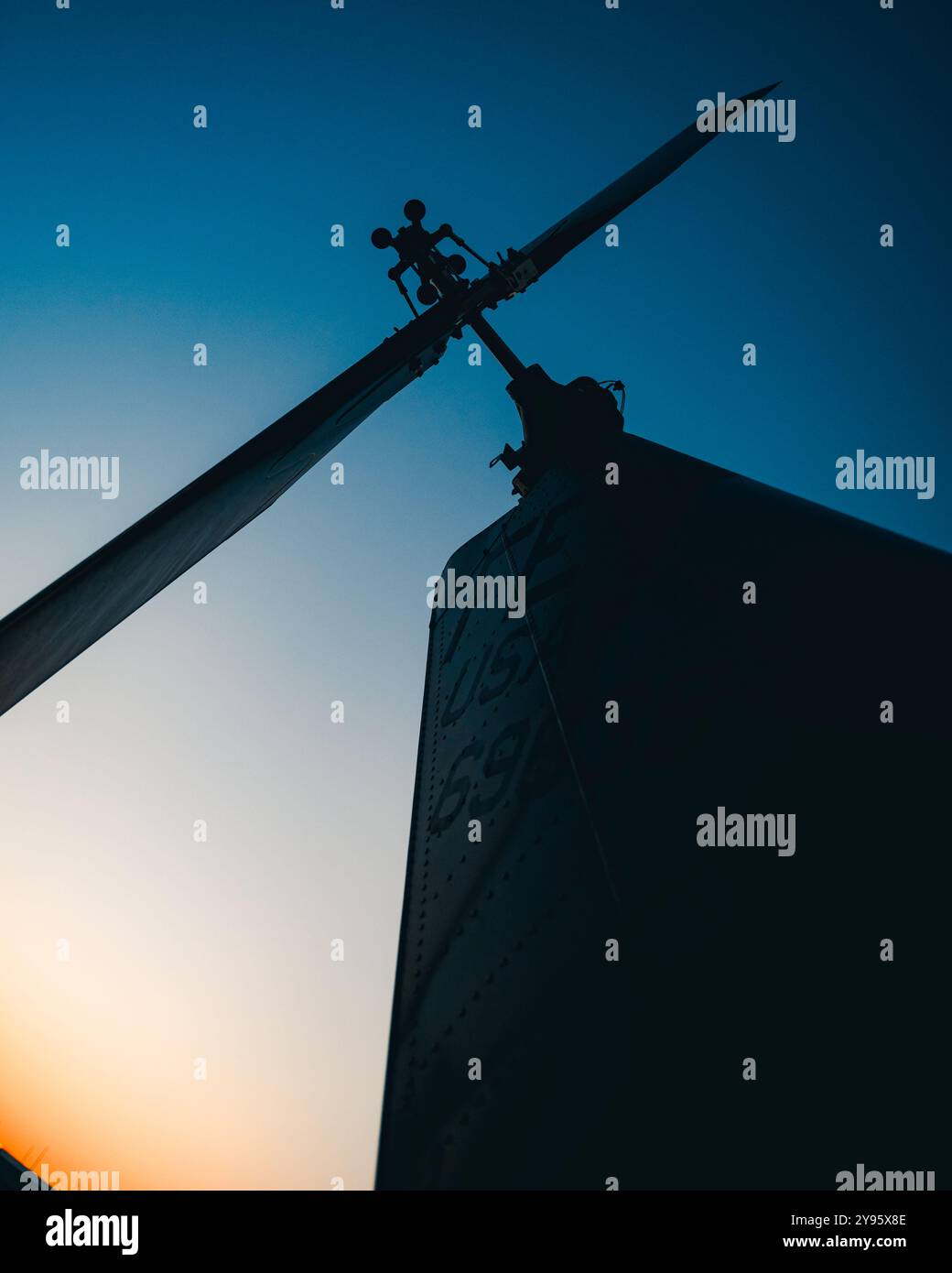 A UH-1N Huey attached to the 37th Helicopter Squadron sits on a helipad ...